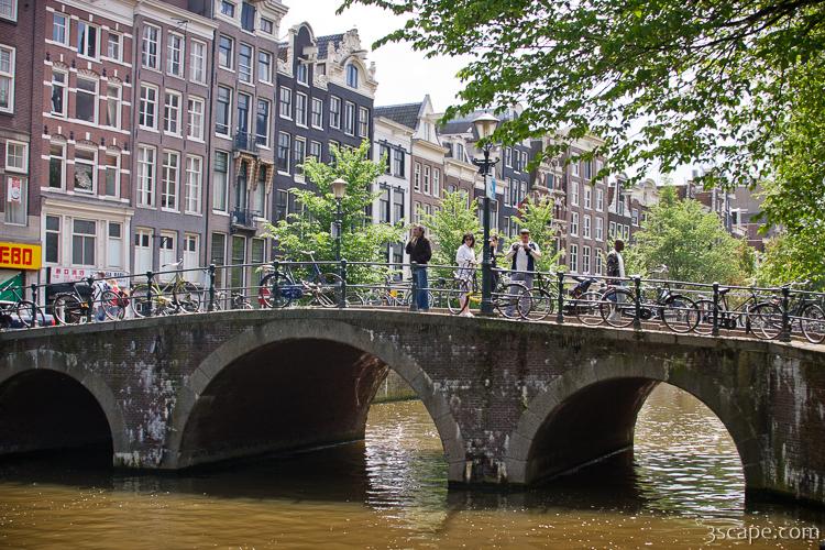 One of many canal bridges around the city Fine Art Print by Adam Romanowicz