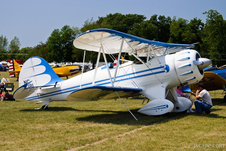 White and Blue biplane Fine Art Print by Adam Romanowicz