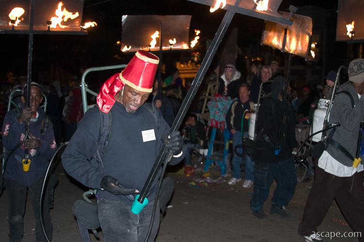 Mardi Gras Flambeaux (flame torch carriers) Photograph by Adam Romanowicz