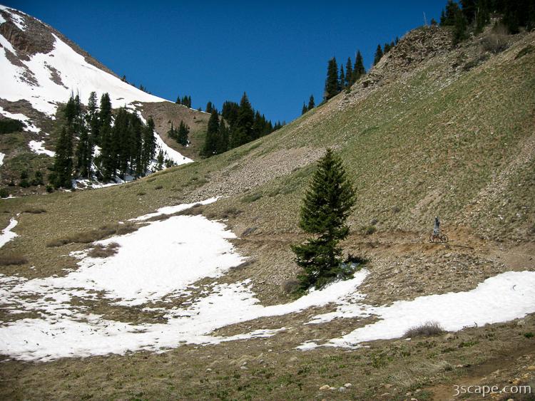 Hiking the bikes up to Burro Pass Fine Art Print by Adam Romanowicz