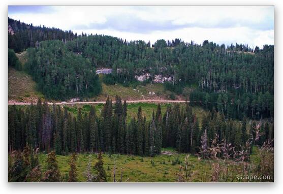 Geyser Pass road looping around Fine Art Print by Adam Romanowicz